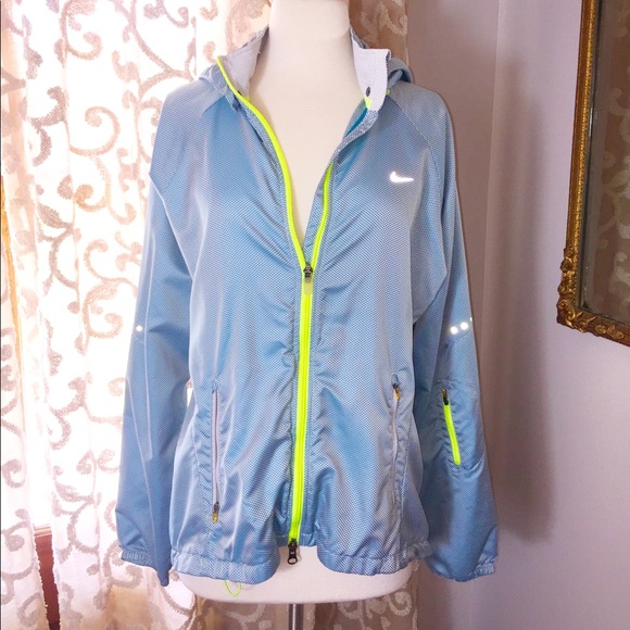 Nike | Jackets & Coats | Nike Storm Fit Blue Checkered Womens Rain ...